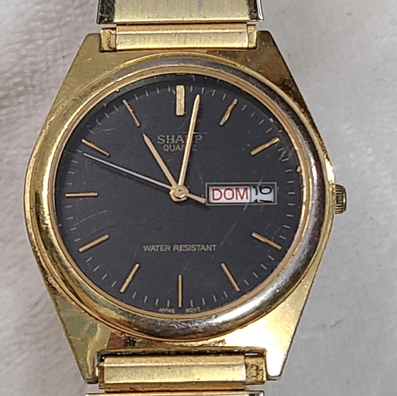 Sharp | Accessories | Vintage Sharp Mens Gold Tone Black Face Watch ...